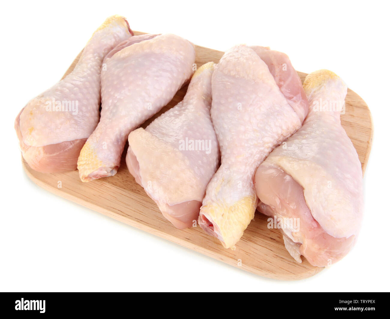 Raw chicken legs isolated on white Stock Photo - Alamy