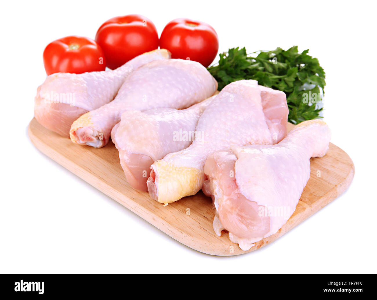 Raw chicken legs isolated on white Stock Photo - Alamy