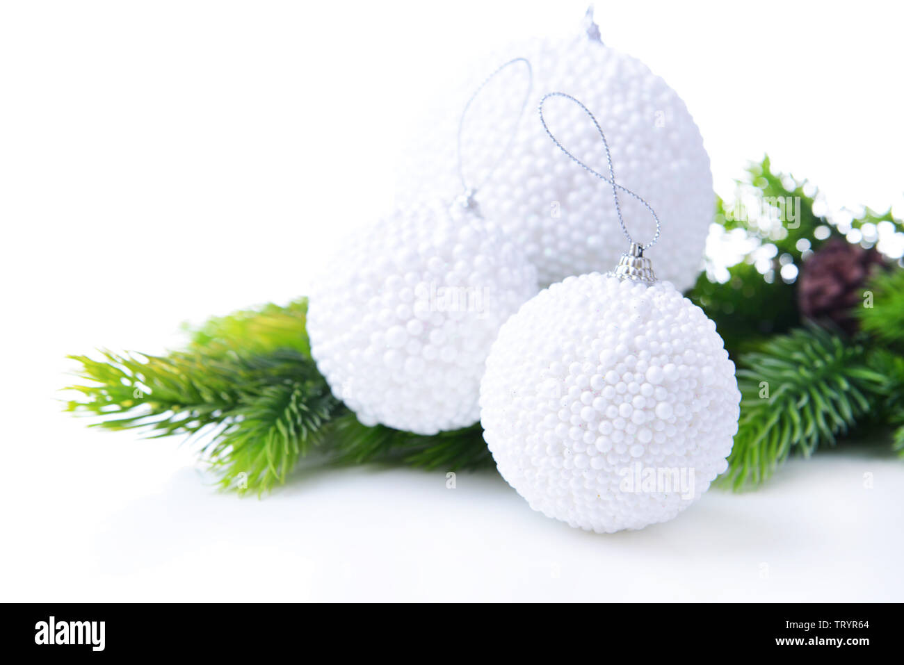 Christmas balls on fir tree, isolated on white Stock Photo - Alamy