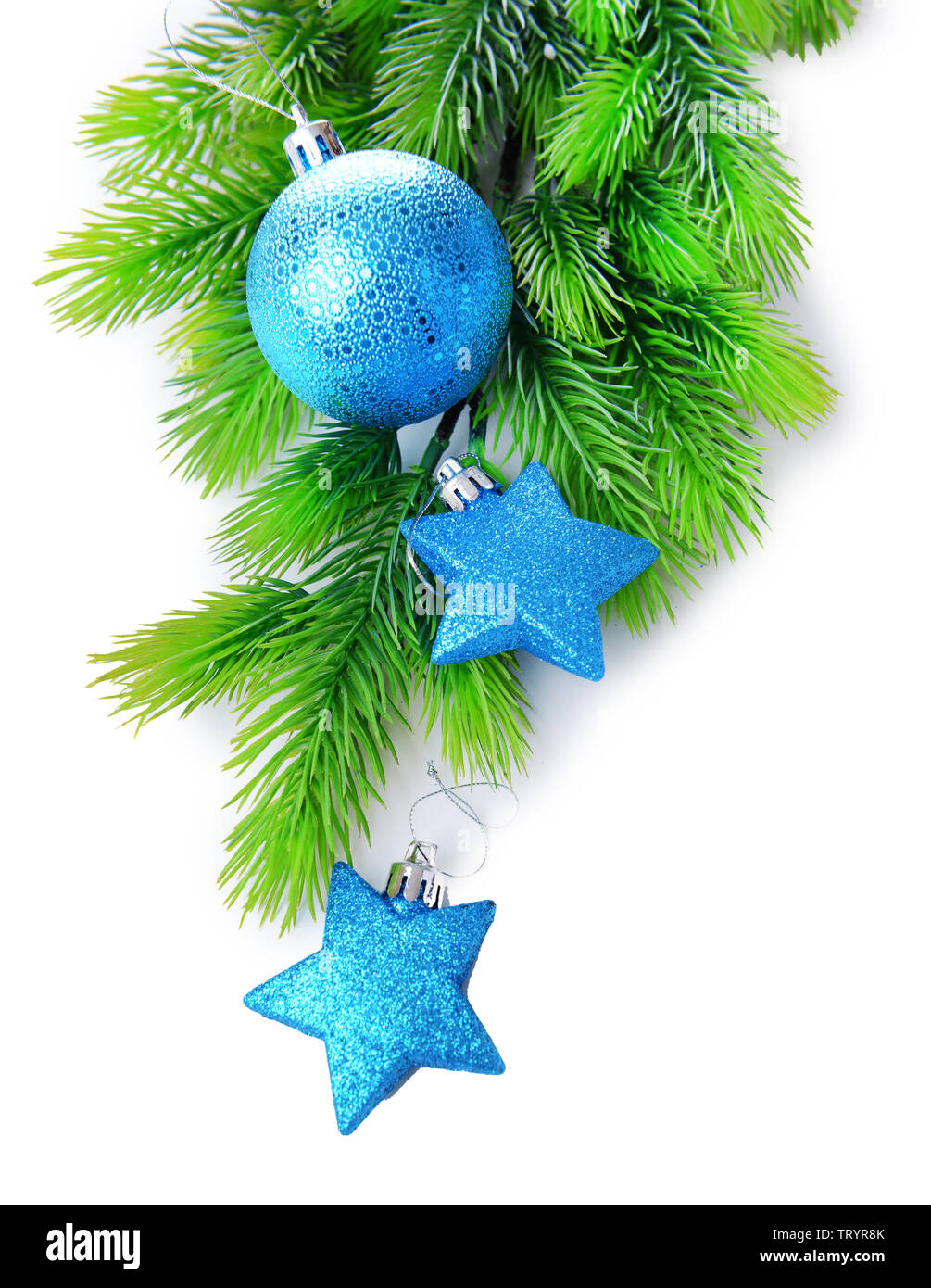 Christmas balls and decorative stars on fir tree, isolated on white ...
