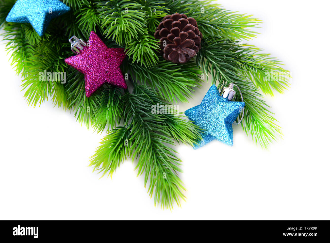 Christmas decorative stars on fir tree, isolated on white Stock Photo ...