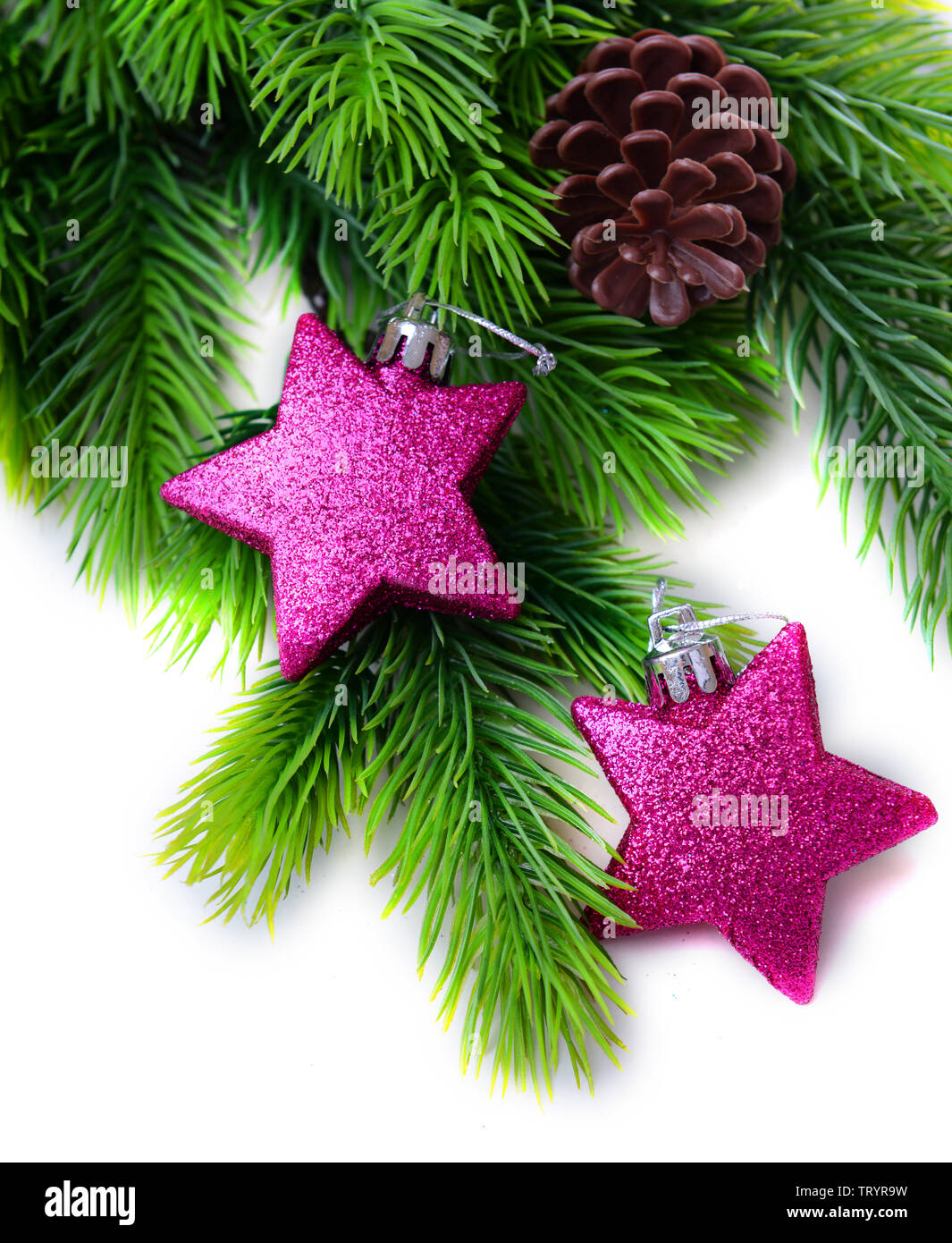 Christmas decorative stars on fir tree, isolated on white Stock Photo ...