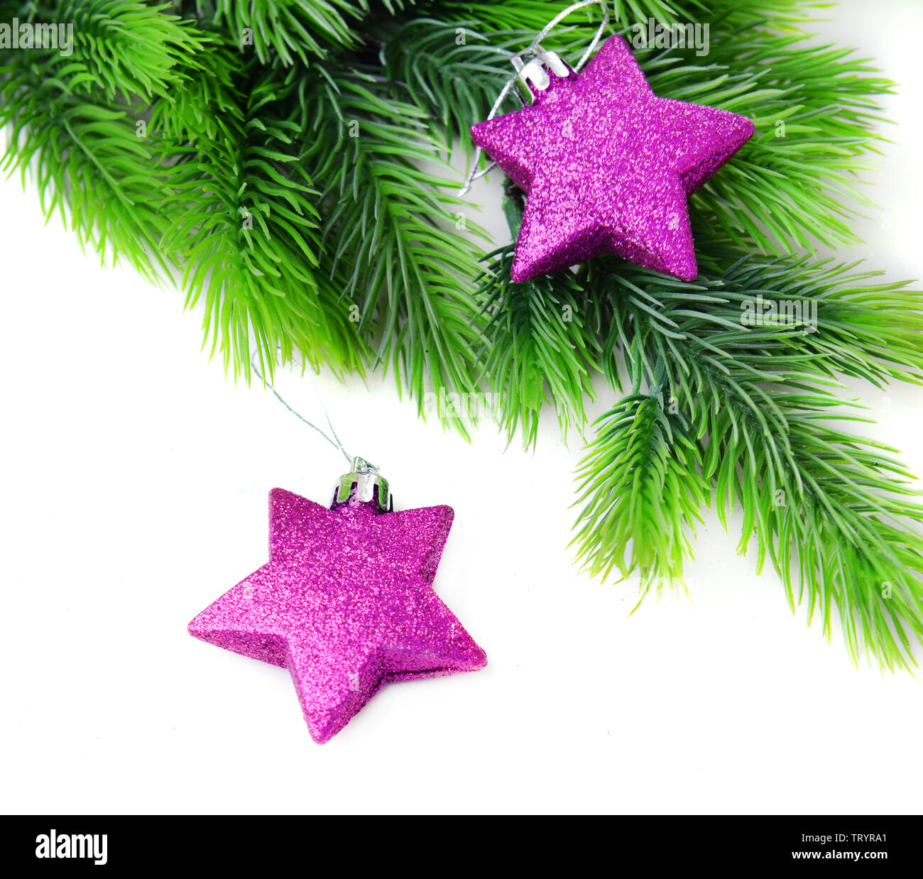 Christmas decorative stars on fir tree, isolated on white Stock Photo ...