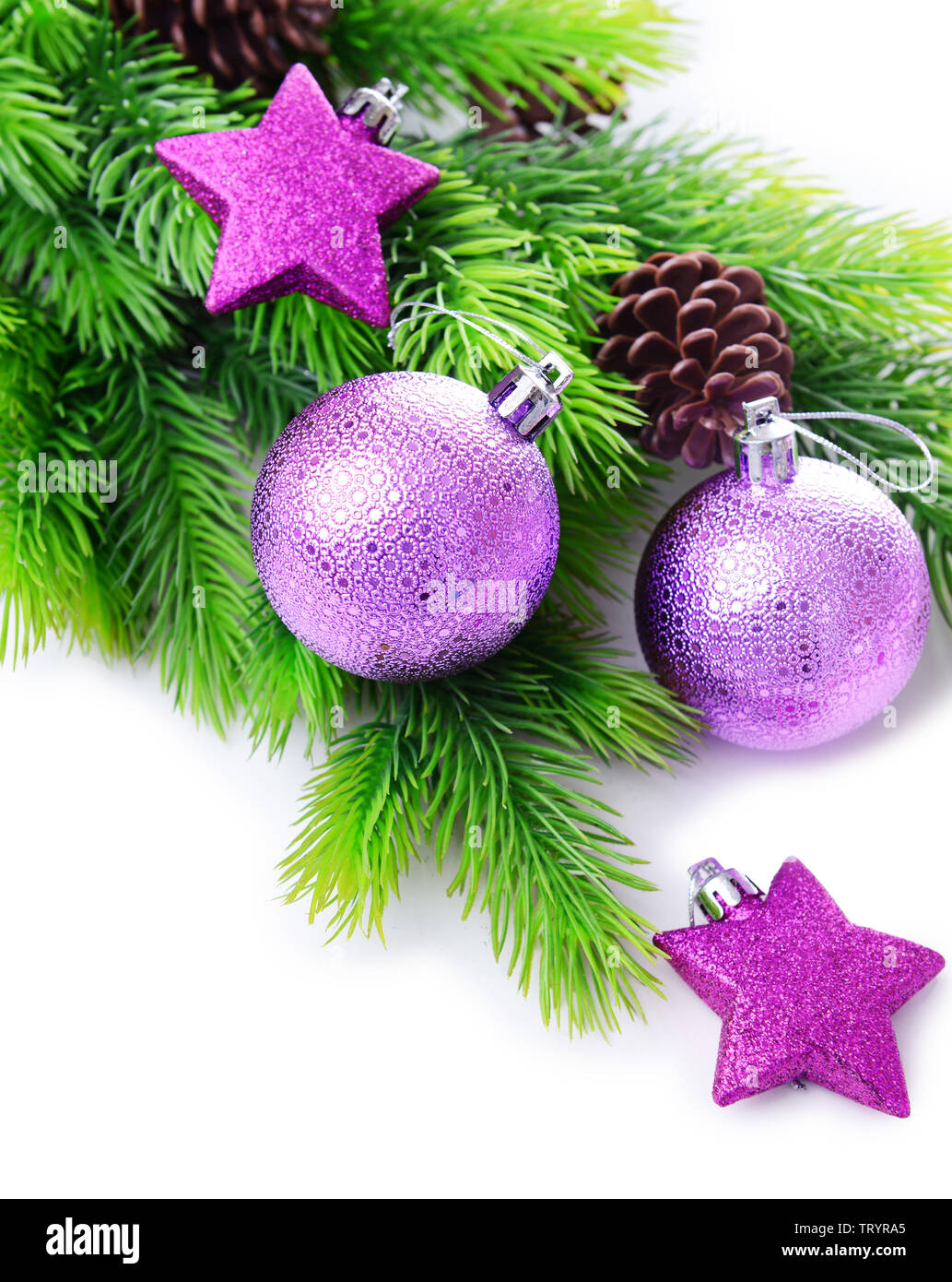 Christmas balls and decorative stars on fir tree, isolated on white ...
