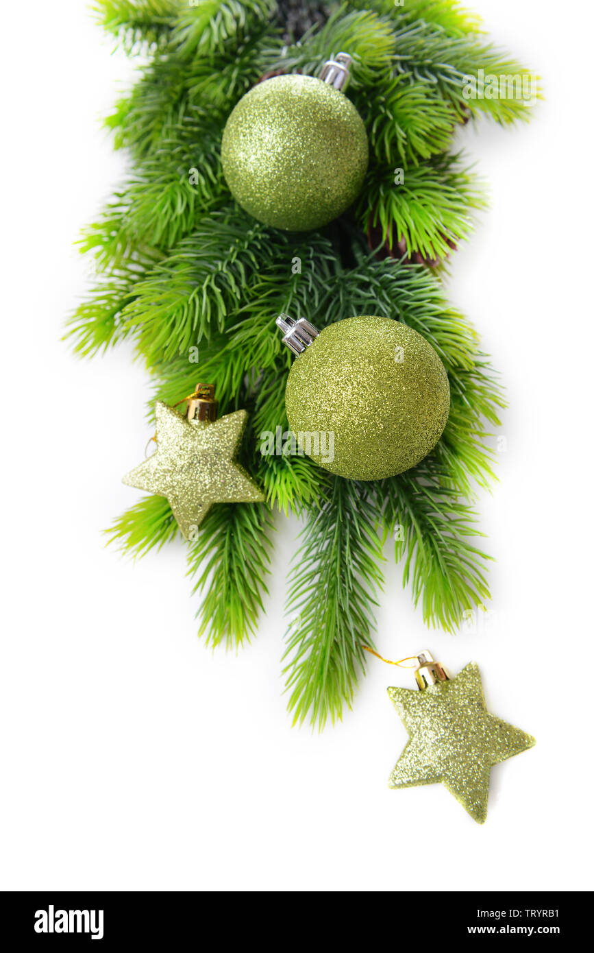 Christmas balls and decorative stars on fir tree, isolated on white ...