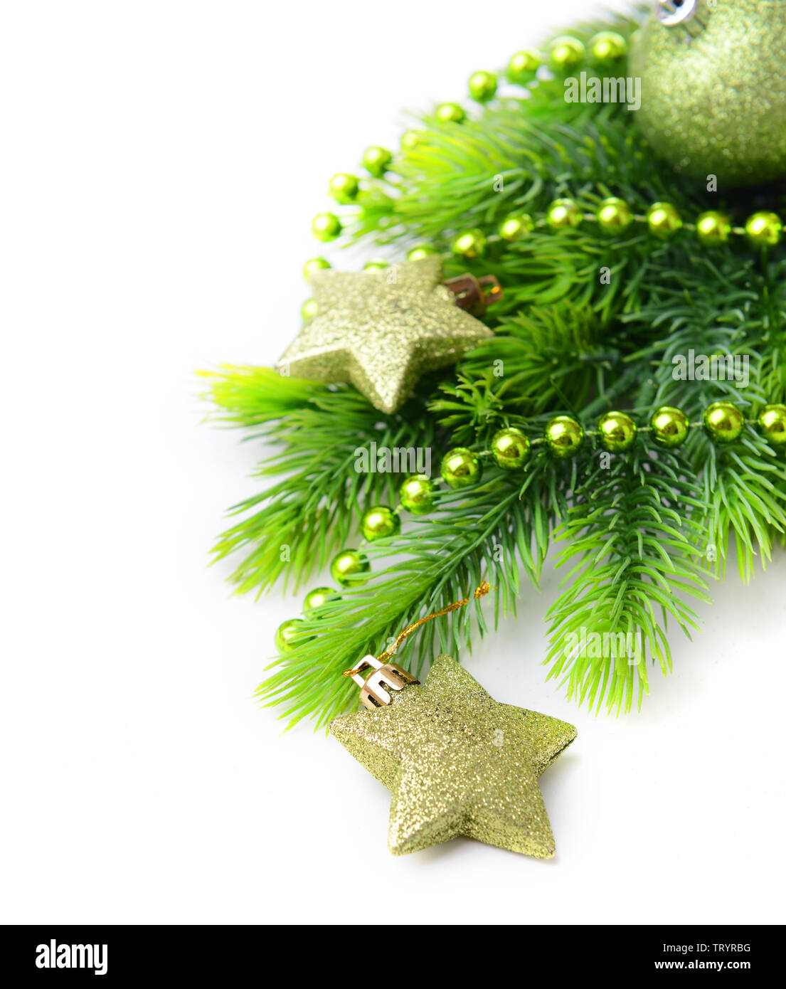 Christmas balls and decorative stars on fir tree, isolated on white ...