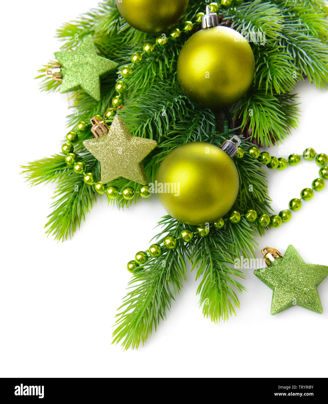 Christmas balls and decorative stars on fir tree, isolated on white ...