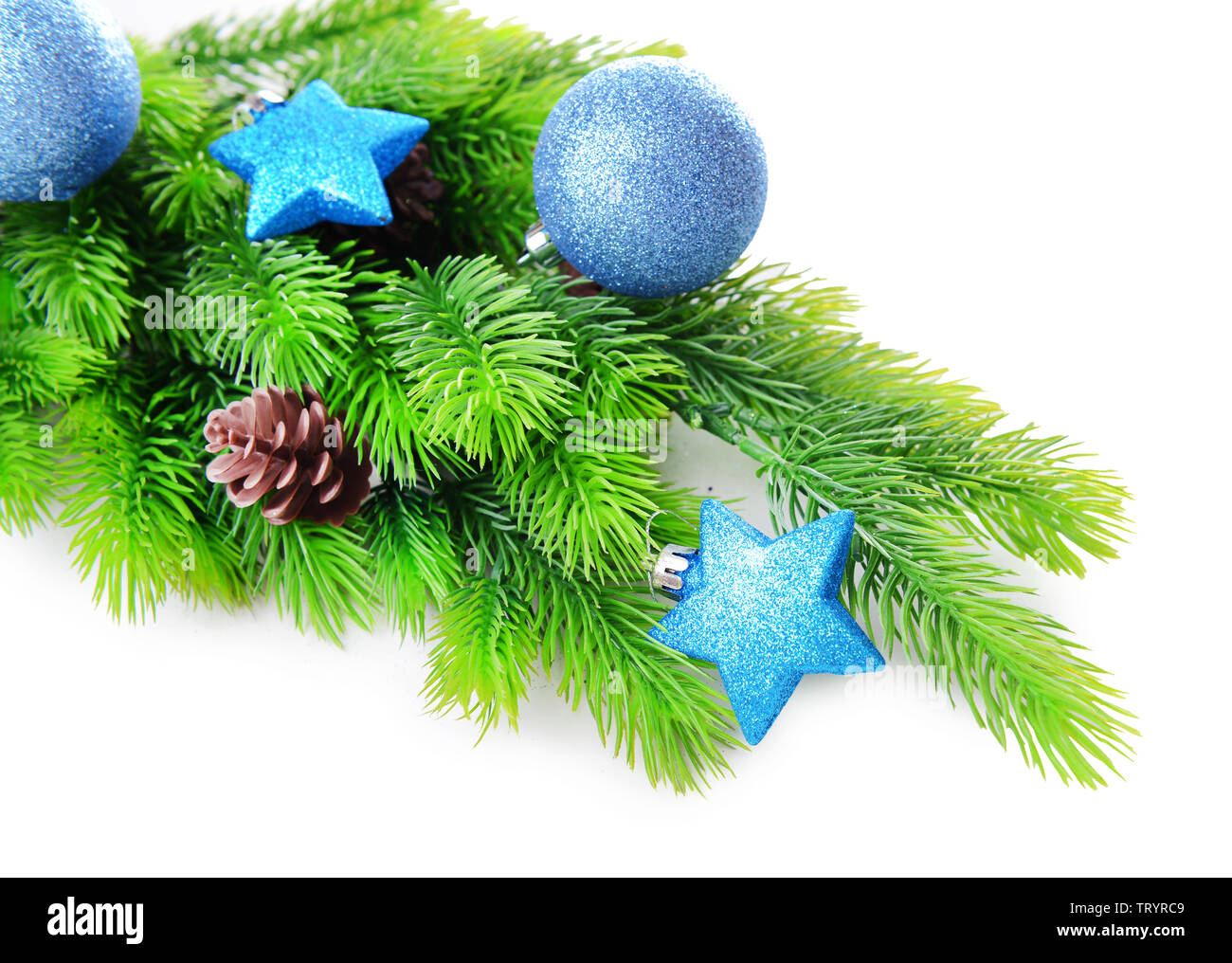 Christmas balls and decorative stars on fir tree, isolated on white ...