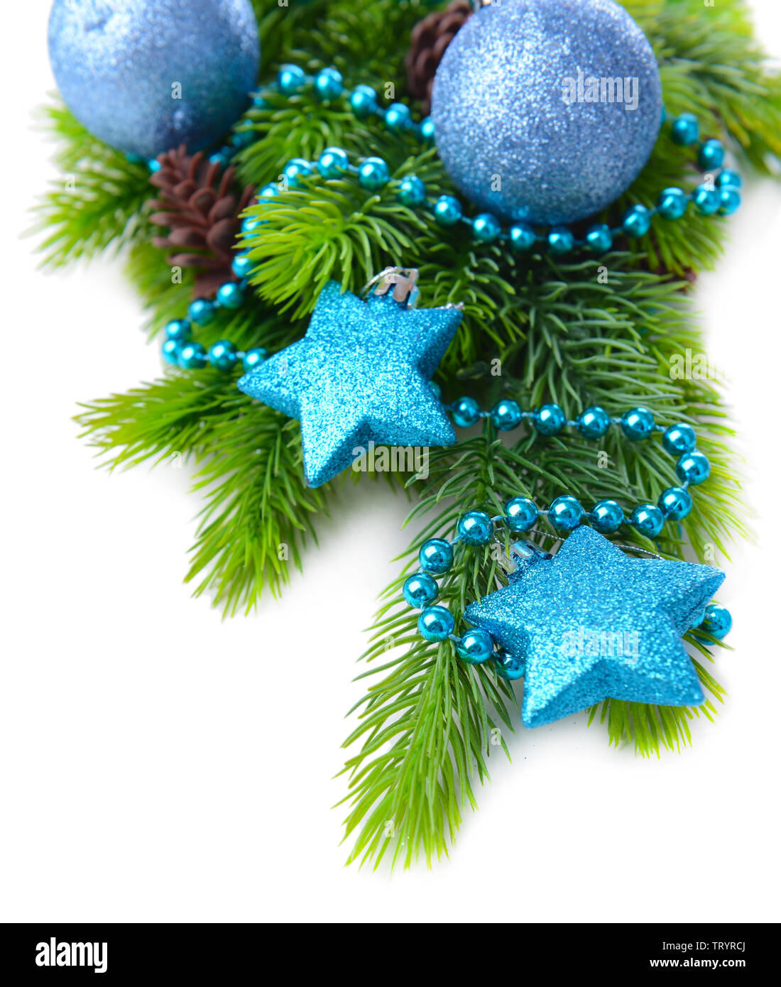 Christmas balls and decorative stars on fir tree, isolated on white ...