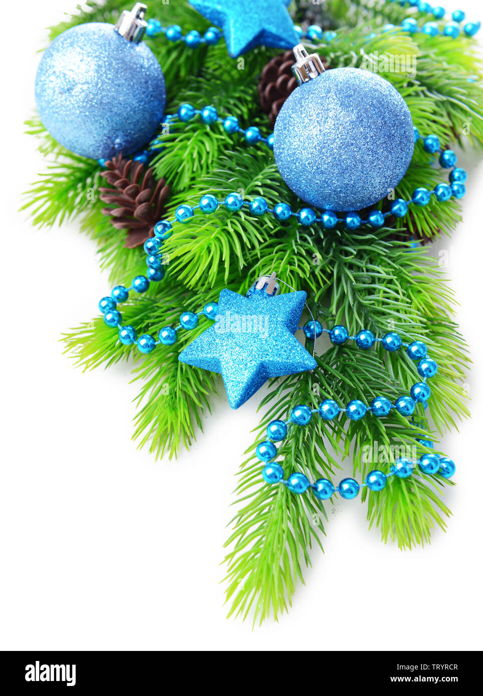 Christmas balls and decorative stars on fir tree, isolated on white ...