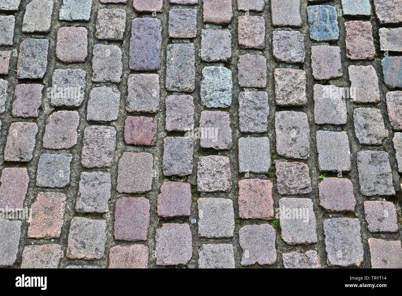 Detailed close up view on cobblestone pavement streets in high ...