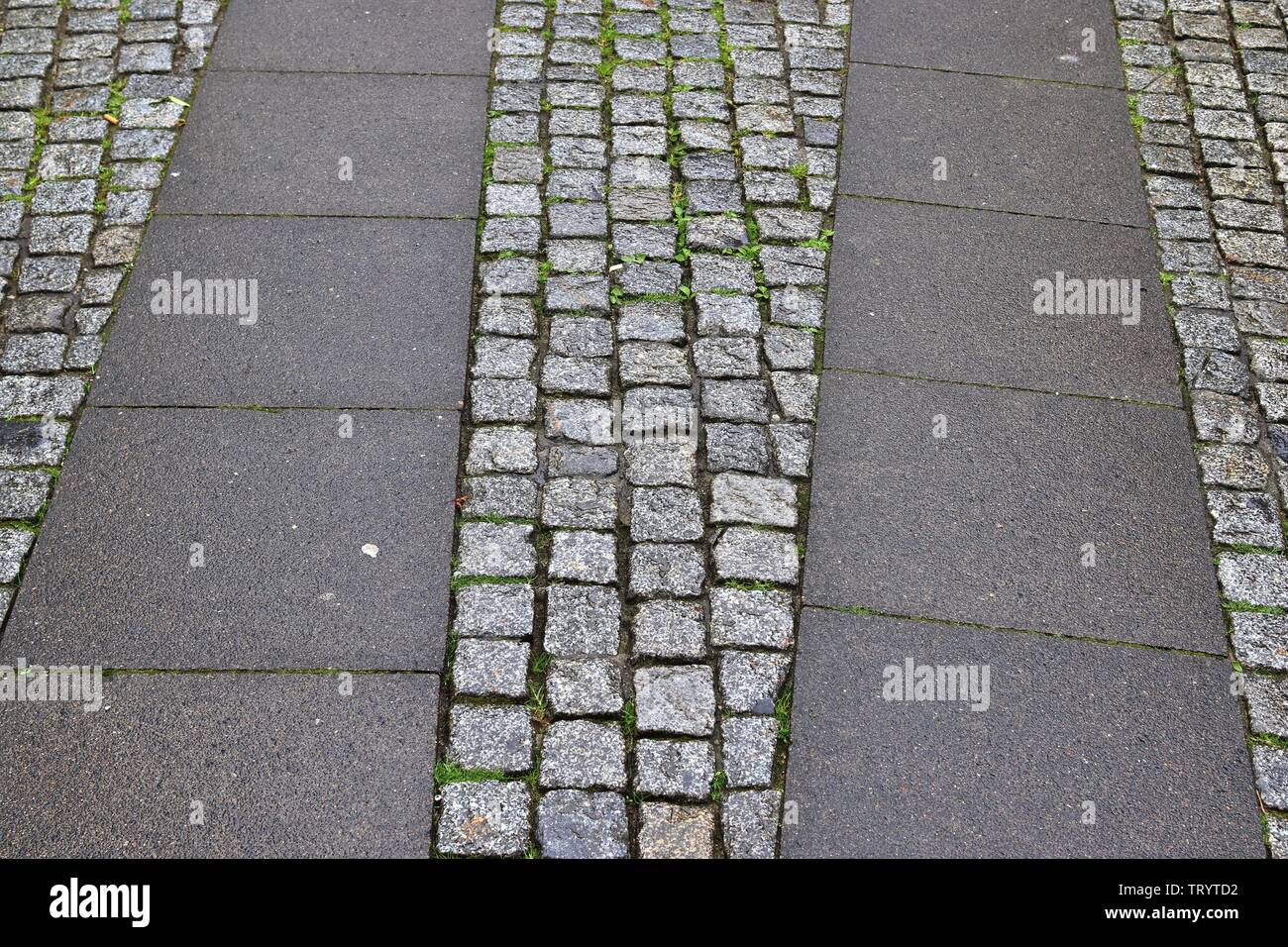 Detailed close up view on cobblestone pavement streets in high ...