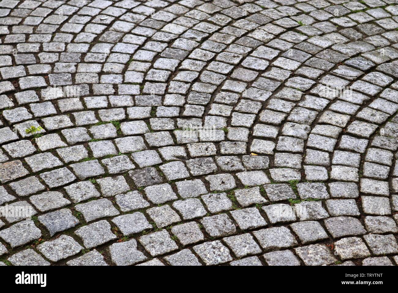Detailed close up view on cobblestone pavement streets in high ...