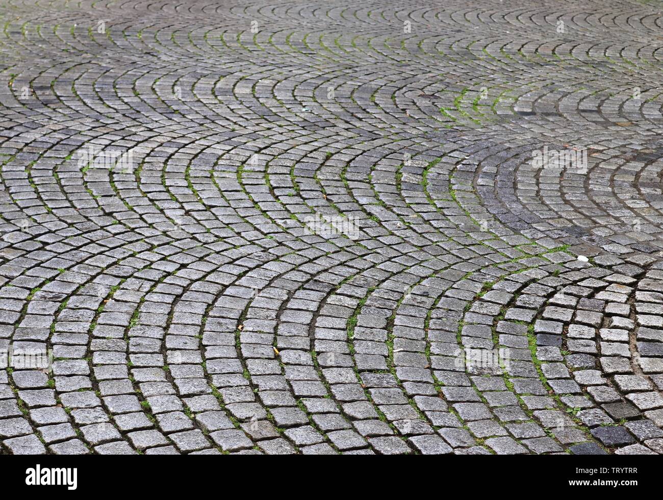 Detailed close up view on cobblestone pavement streets in high ...