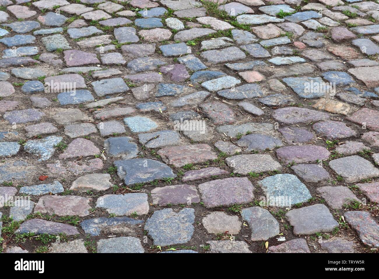 Detailed close up view on cobblestone pavement streets in high ...