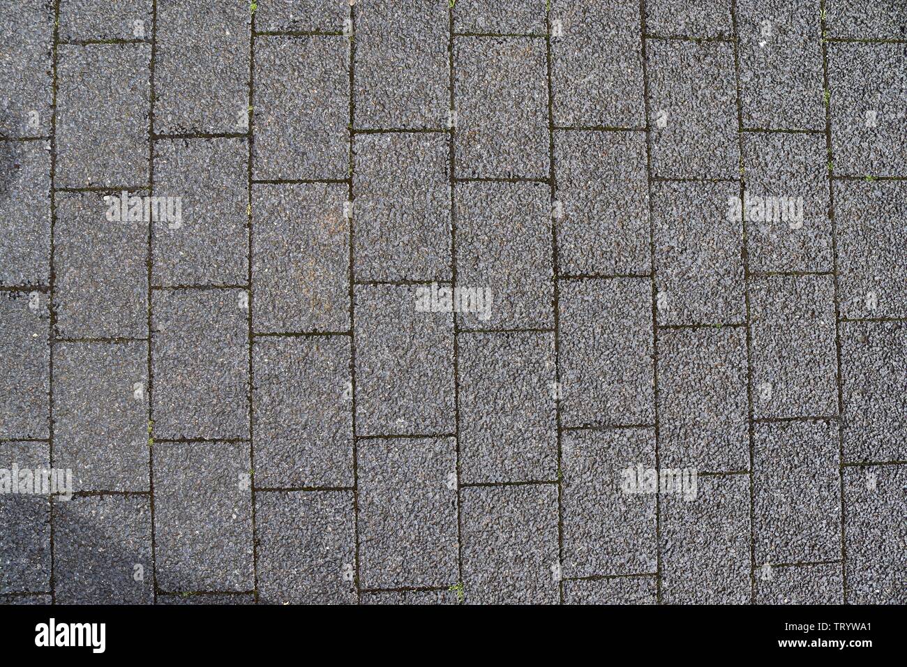 Detailed close up view on cobblestone pavement streets in high ...