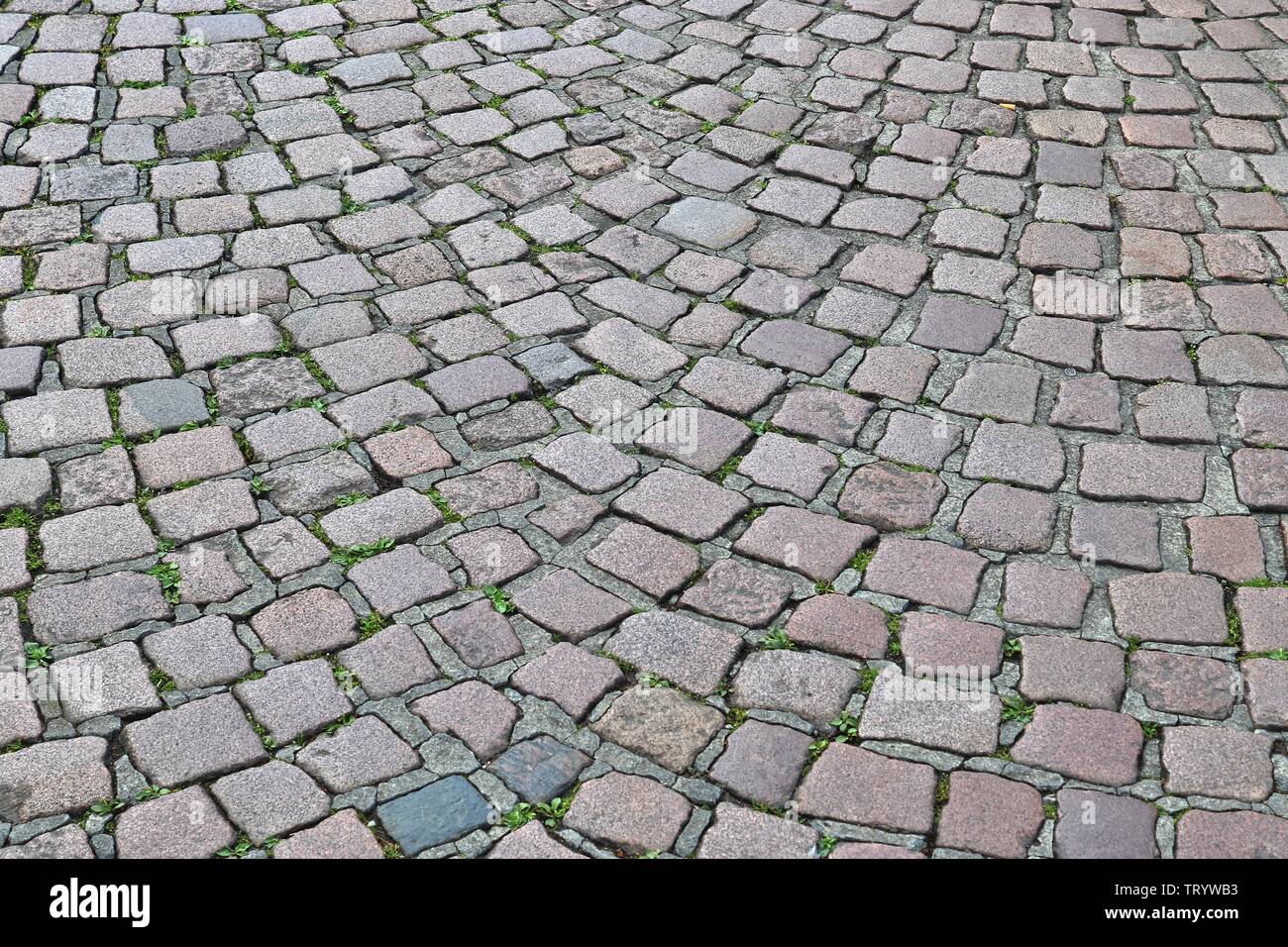 Detailed close up view on cobblestone pavement streets in high ...