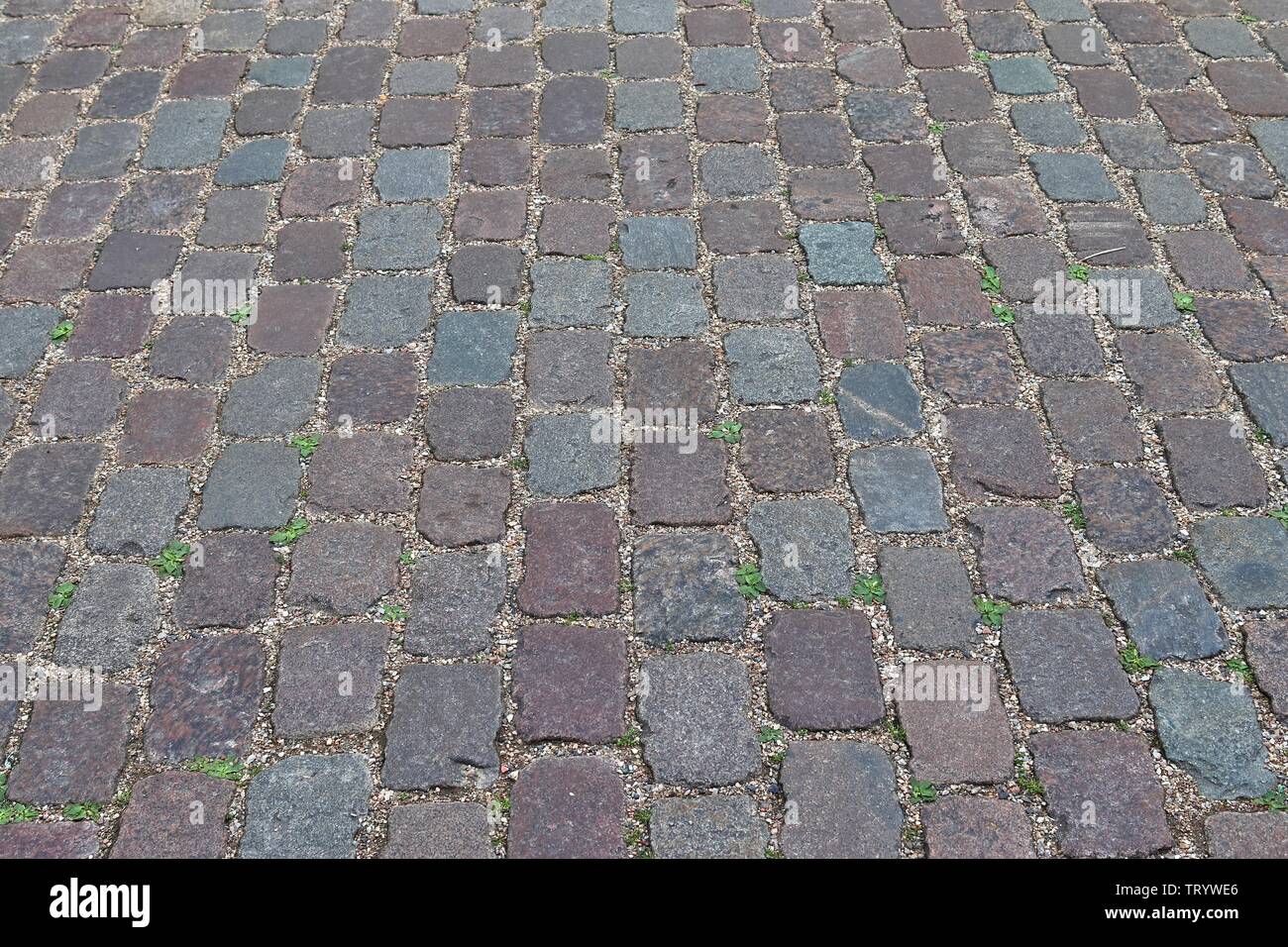 Detailed close up view on cobblestone pavement streets in high ...