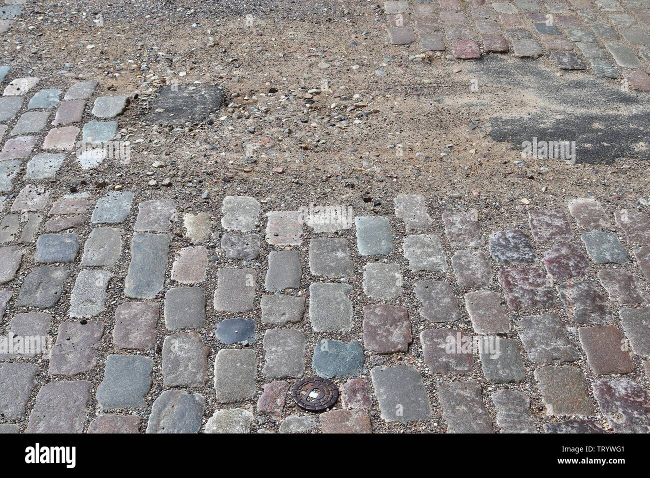 Detailed close up view on cobblestone pavement streets in high ...