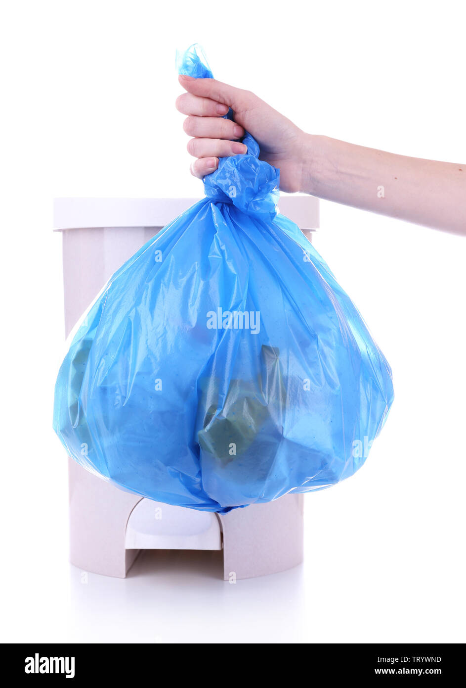 Hand holding trash bag, isolated on white Stock Photo - Alamy