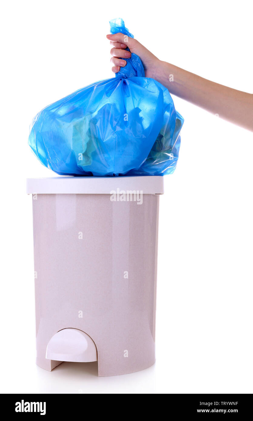 Hand holding trash bag, isolated on white Stock Photo - Alamy