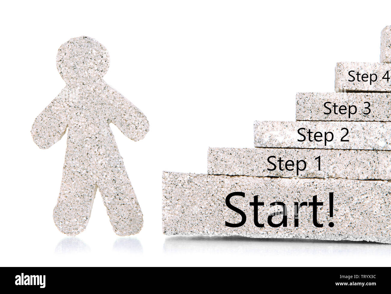 Little man and building blocks in shape of stairs isolated on white ...