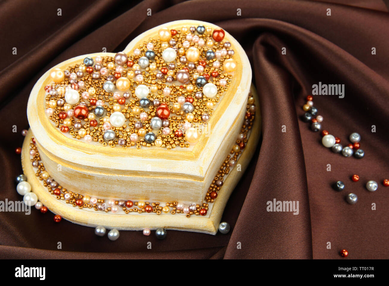 Beautiful hand made casket, on silk background Stock Photo - Alamy