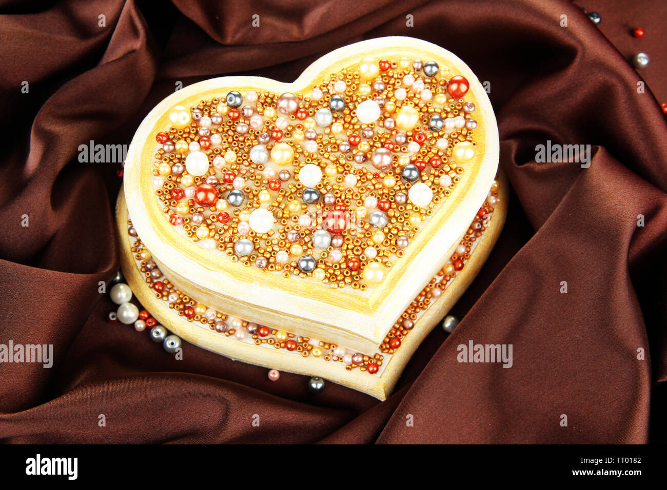 Beautiful hand made casket, on silk background Stock Photo - Alamy