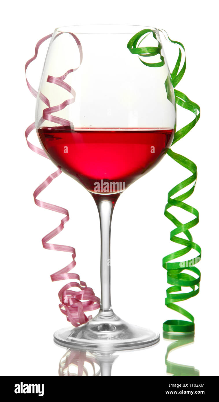 Glass of red wine and streamer after party isolated on white Stock ...