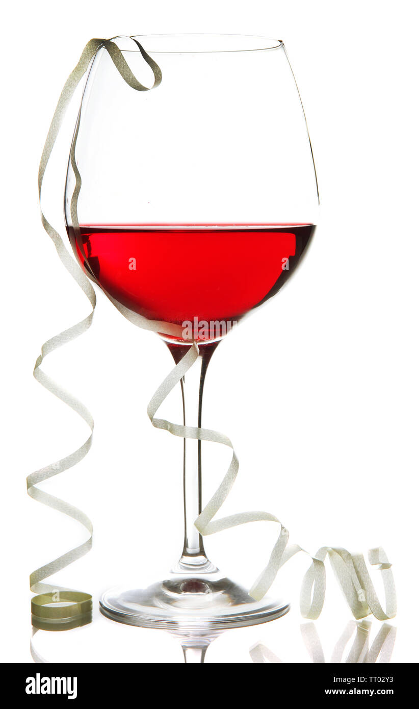Glass of red wine and streamer after party isolated on white Stock ...