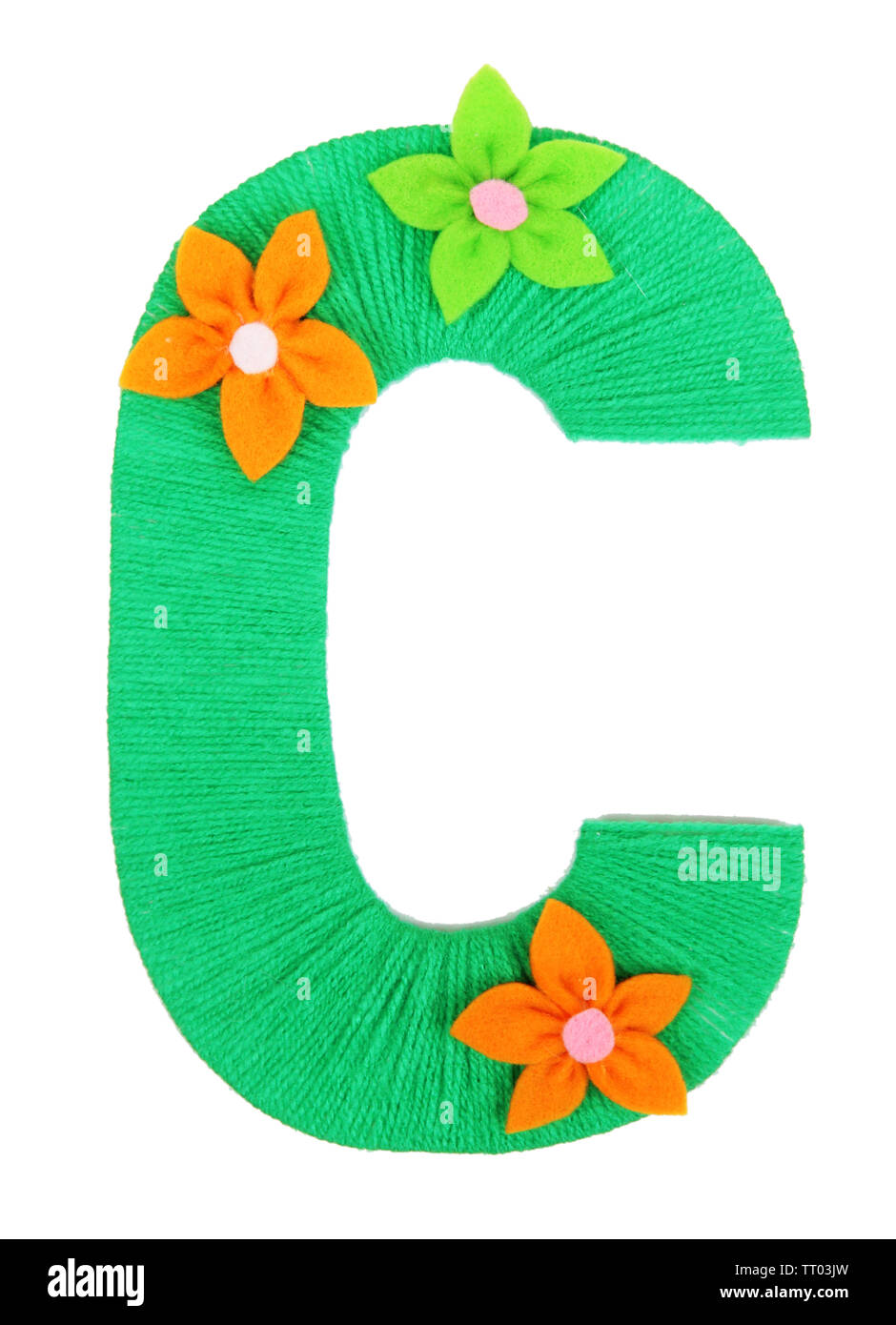 Letter C created with brightly colored knitting yard isolated on white ...