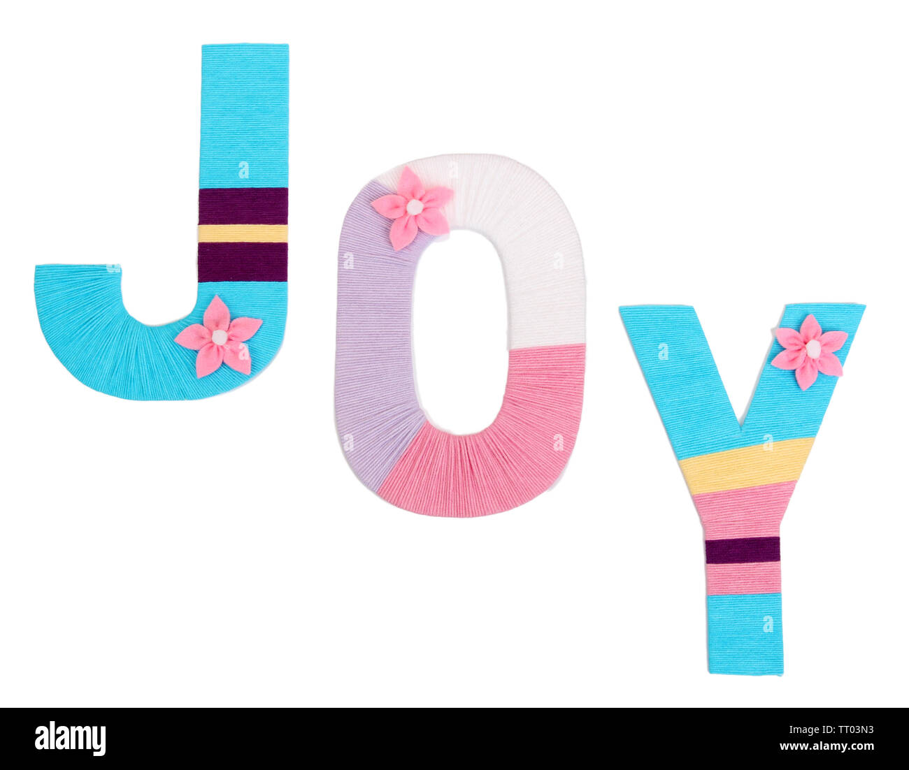 Word Joy created with brightly colored knitting yard isolated on white ...