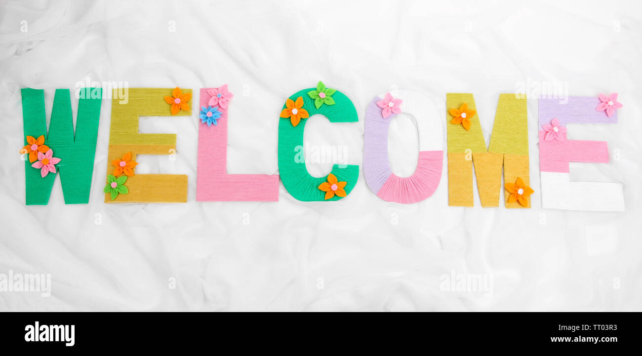 Brightly colored welcome sign hi-res stock photography and images - Alamy