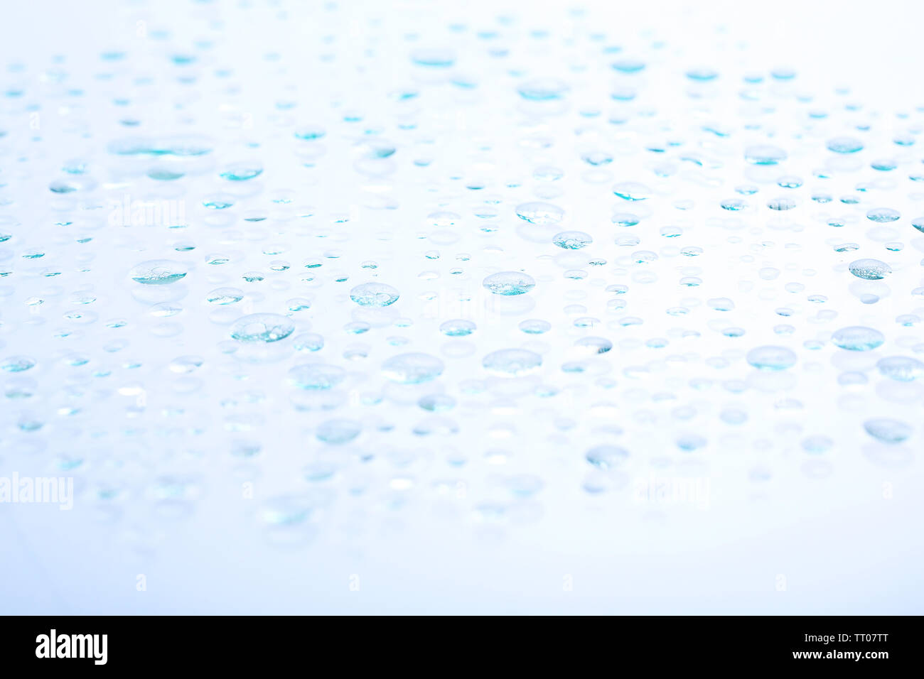 Water drops on white background Stock Photo - Alamy