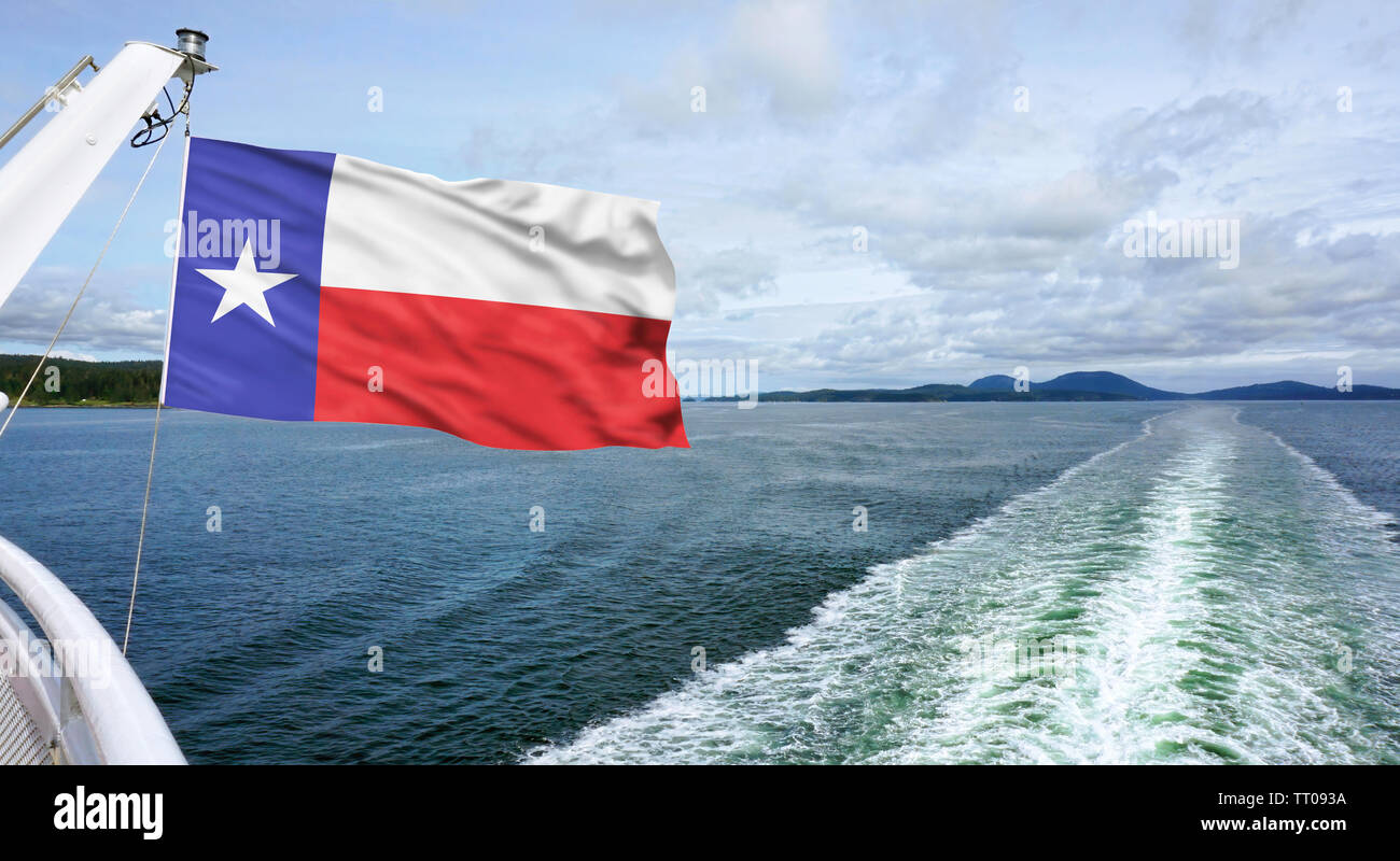 Texas flag flying high against the blue water waves Stock Photo - Alamy