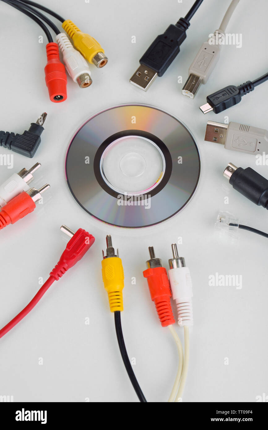 Disk and various connector cables isolated on white Stock Photo - Alamy
