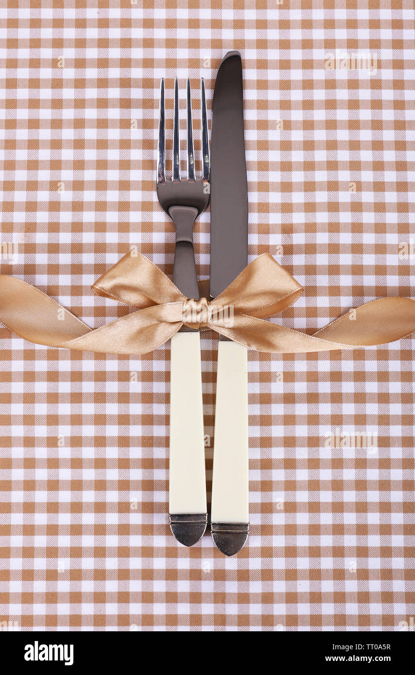 Set of knife and fork on table close-up Stock Photo - Alamy