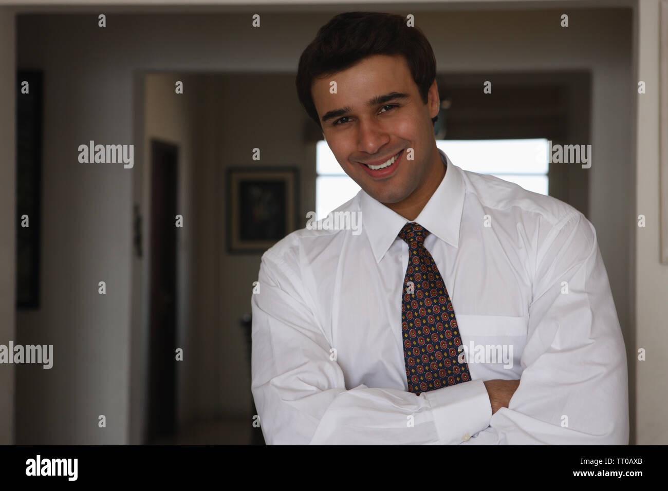 Portrait of a businessman smiling Stock Photo - Alamy