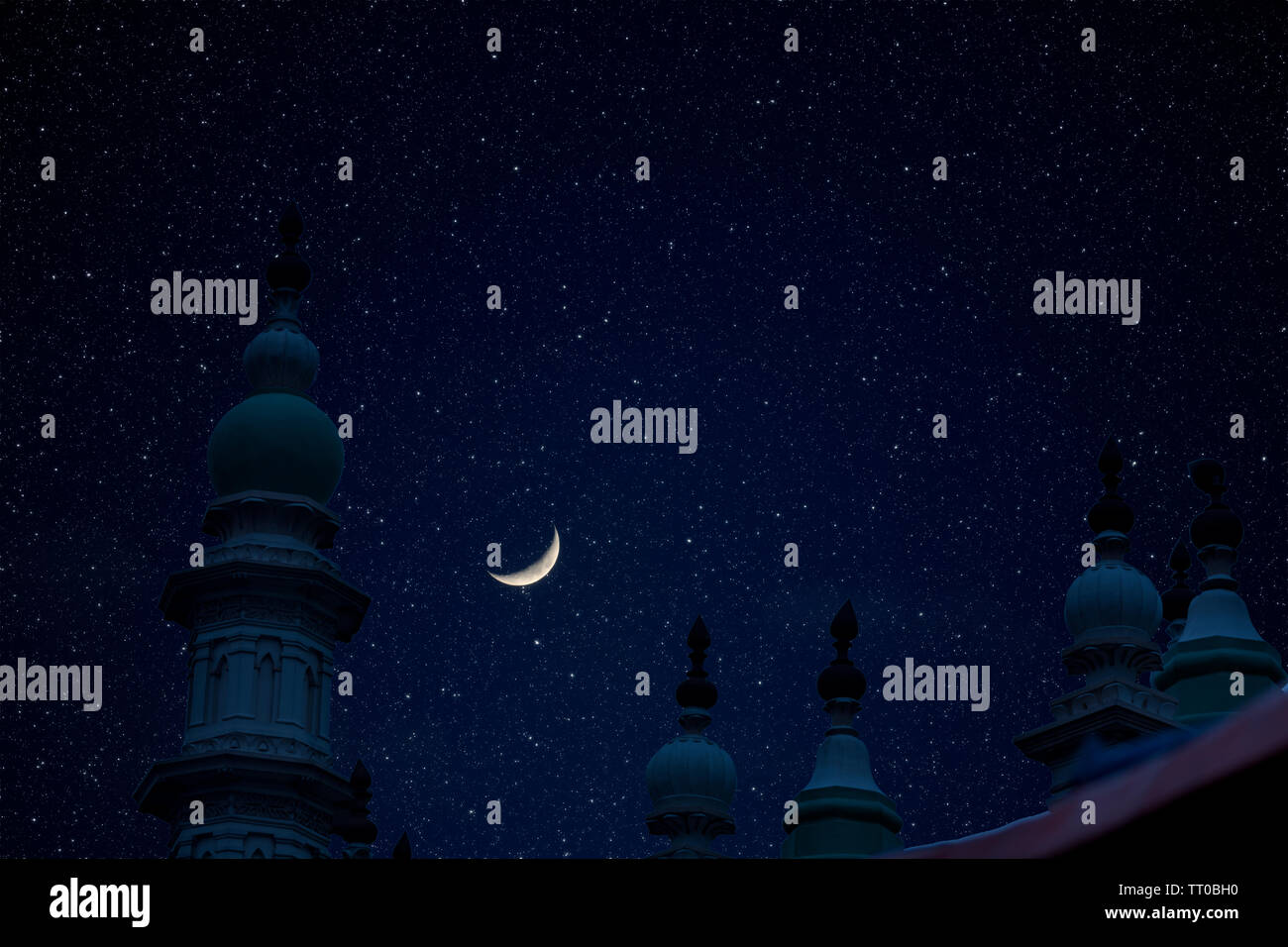 Top of mosque in Eid Ul fitr night with moon and star in night sky ...