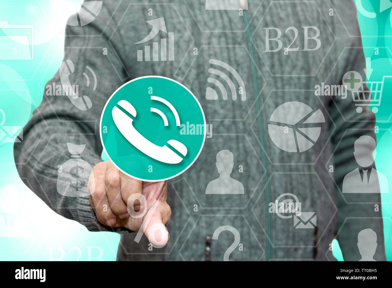An elderly pensioner chooses online telephone on the touch screen on ...