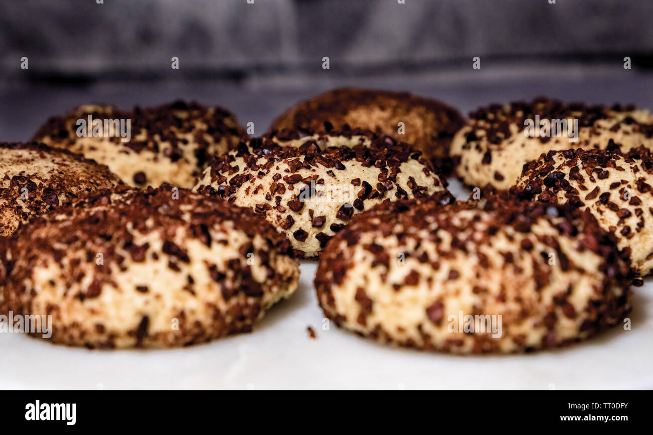 Side View of Crispy, Cream Filled Cookies Coated in Cocoa Nibs Sitting ...