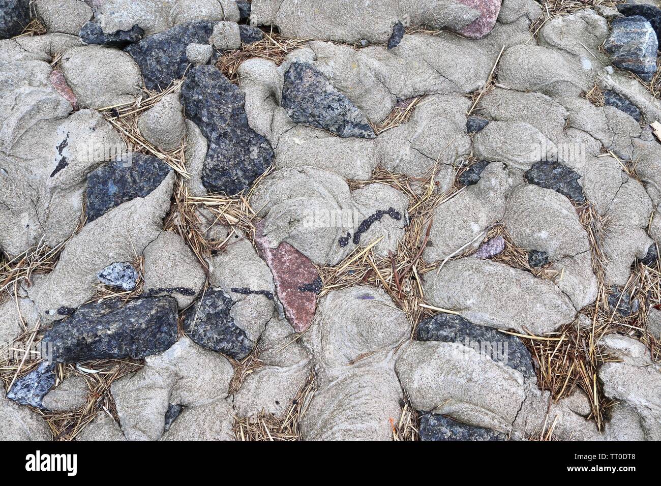 Close up view on fluid cement floors found at the coastline of the ...