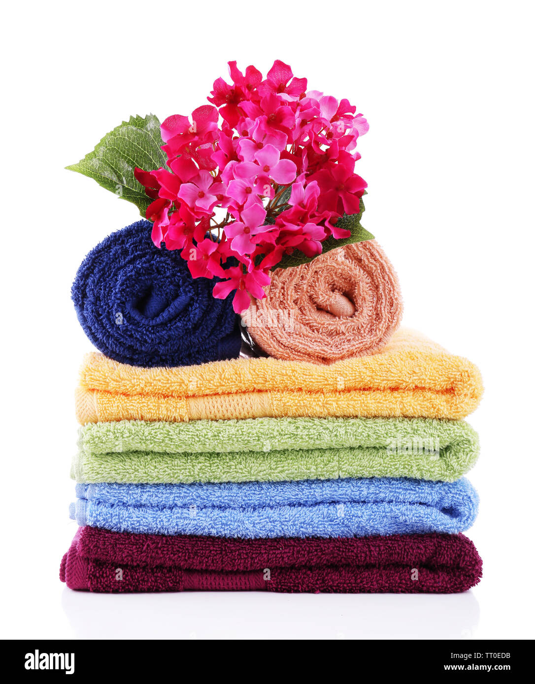 Colorful towels and flowers, isolated on white Stock Photo - Alamy