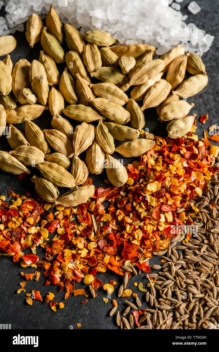 Cardamom, Chilli and Cumin Spices Stock Photo - Alamy