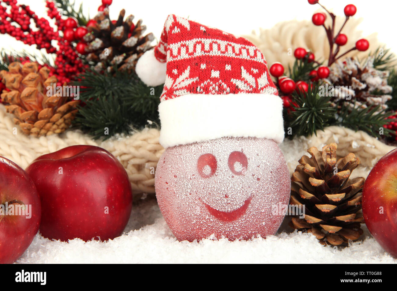 Holiday apple with frosted drawing in snow close up Stock Photo - Alamy