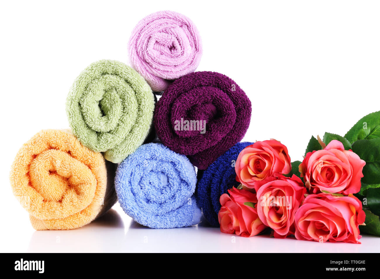 Colorful towels isolated on white Stock Photo - Alamy