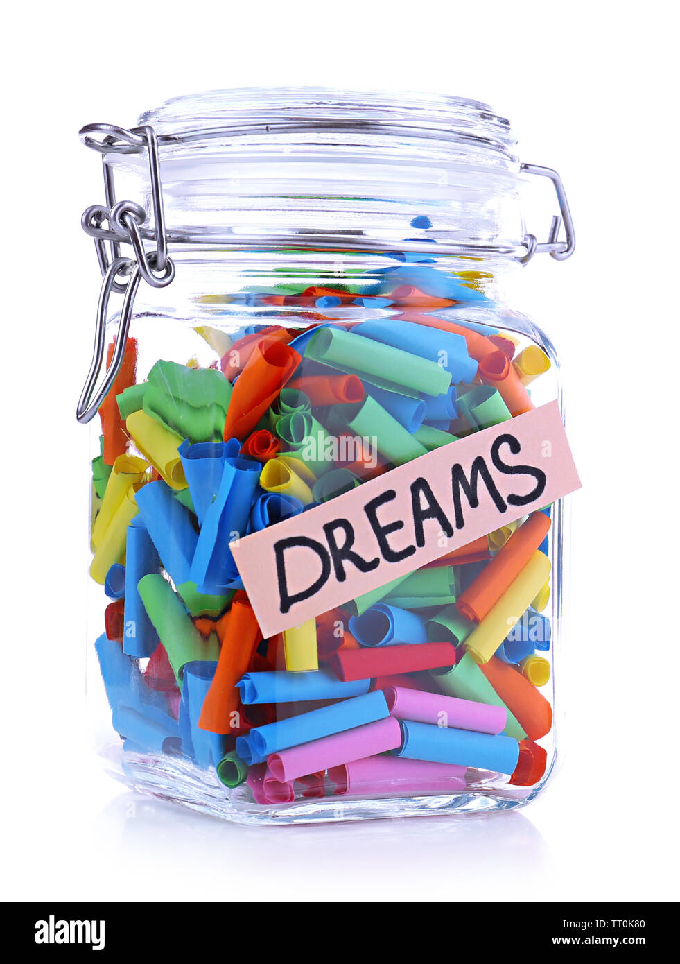 Dreams written on color rolled paper in glass jar, isolated on white ...