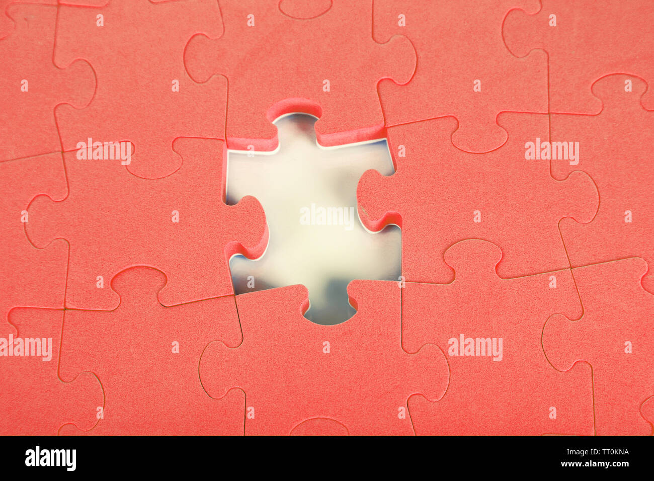 Last piece of jigsaw puzzle, close-up Stock Photo - Alamy