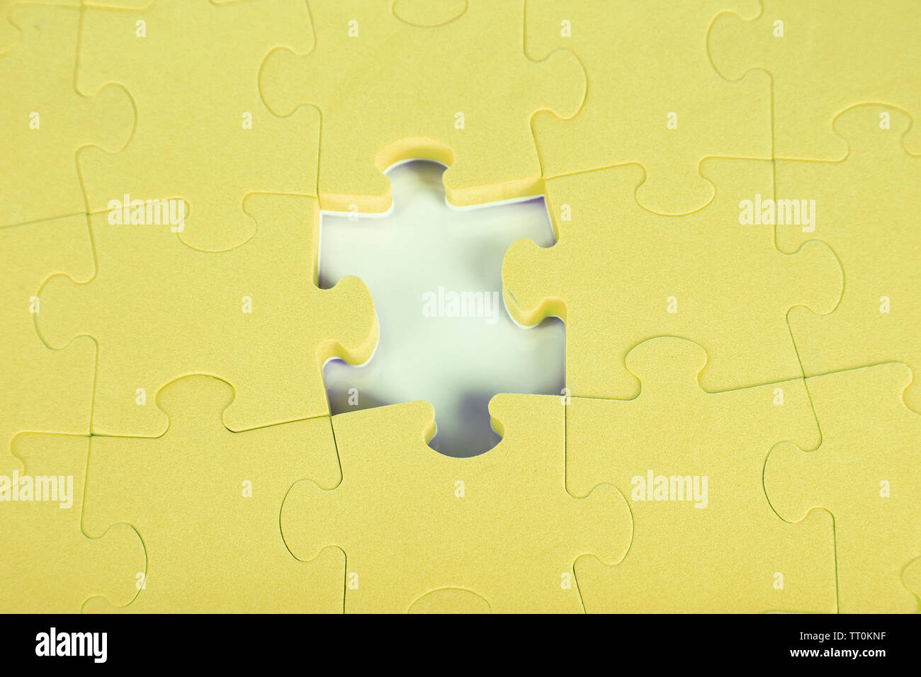 Last piece of jigsaw puzzle, close-up Stock Photo - Alamy