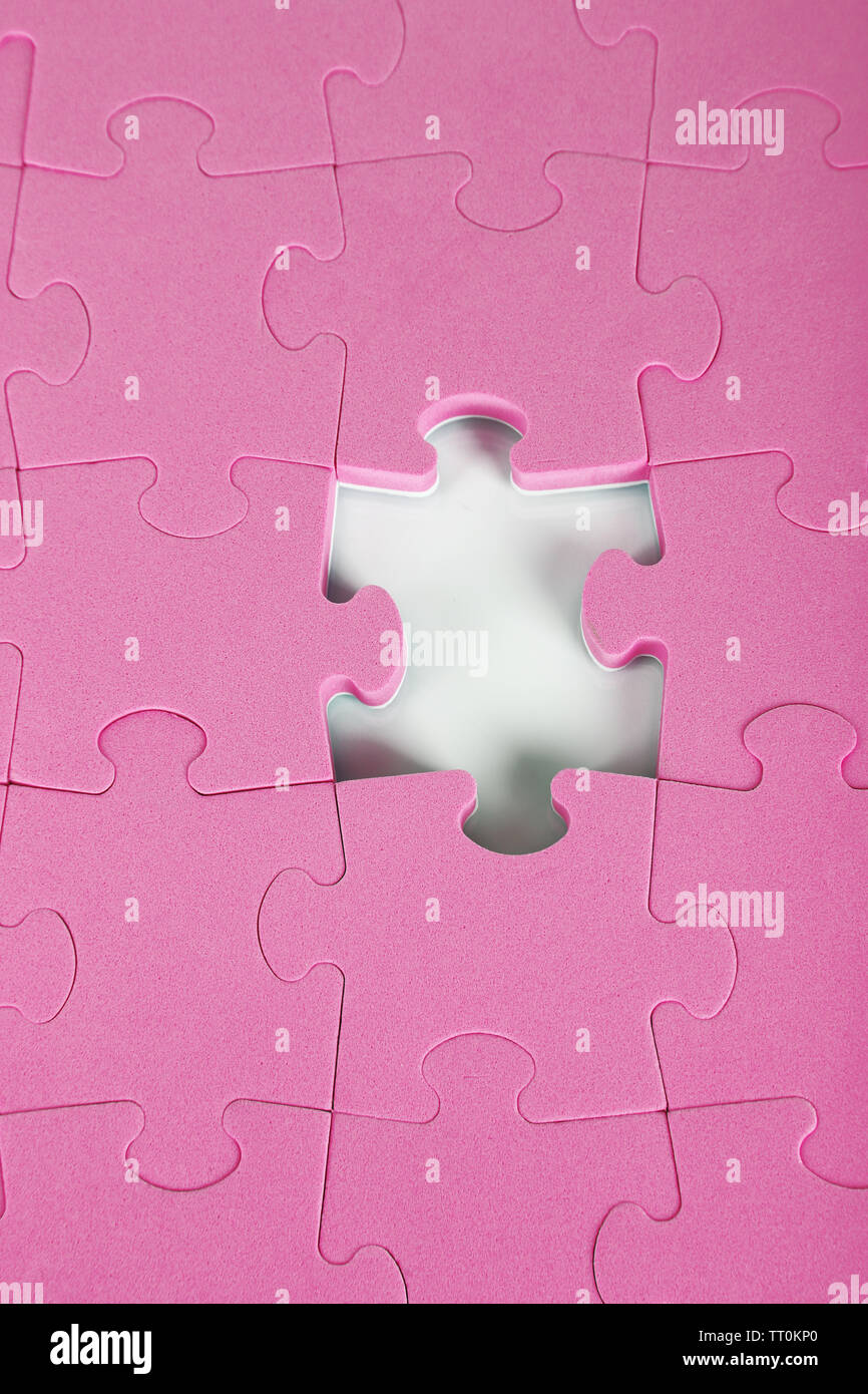 Last piece of jigsaw puzzle, close-up Stock Photo - Alamy